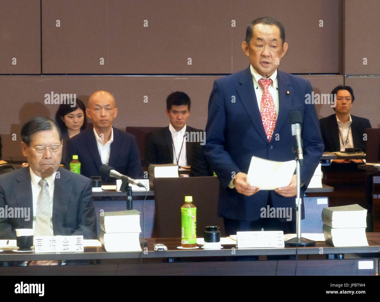 Japanese Justice Minister Katsutoshi Kaneda (R in front row) speaks at ...