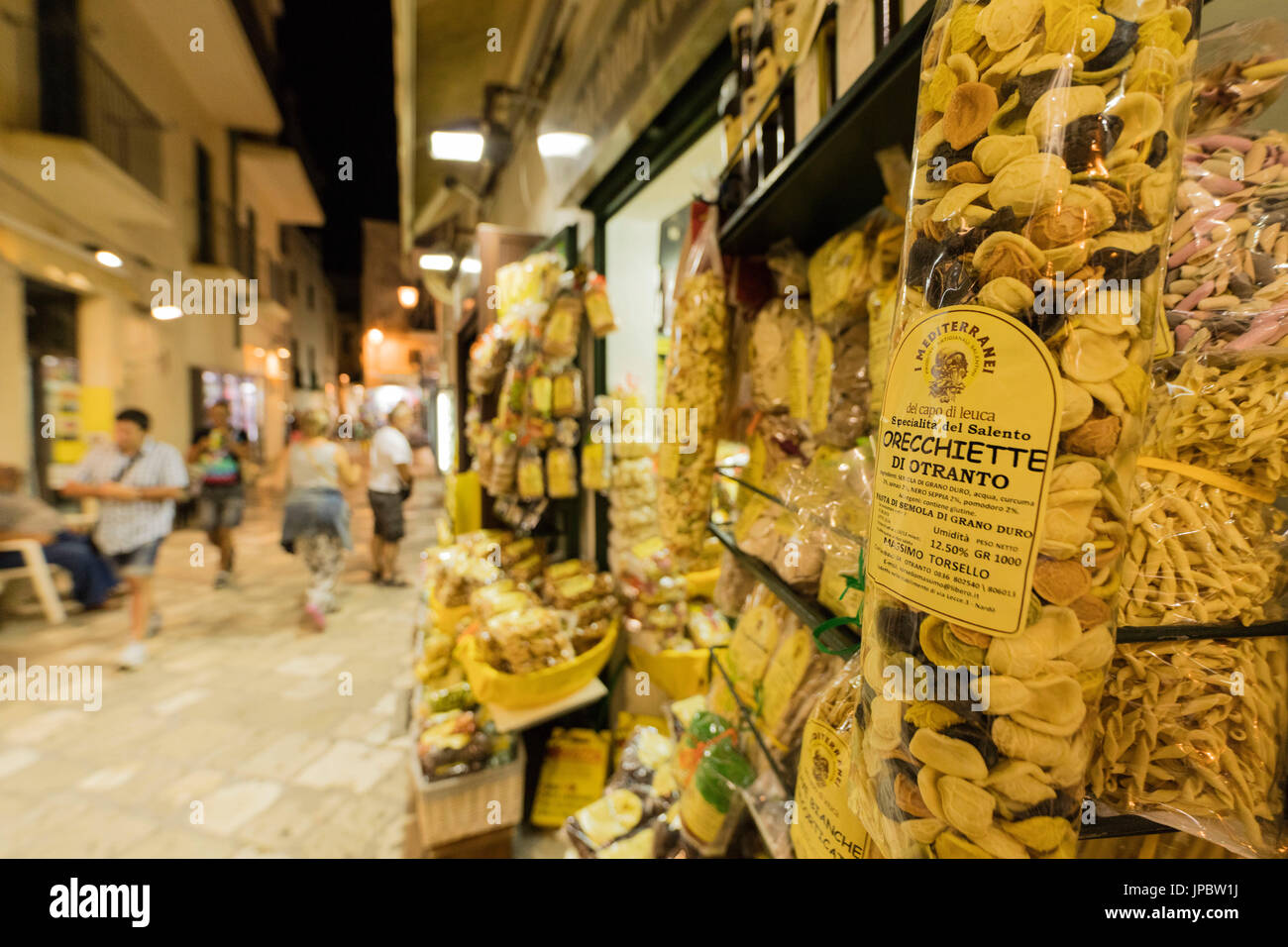 Typical handmade pasta called orecchiette in the shops of the old town ...