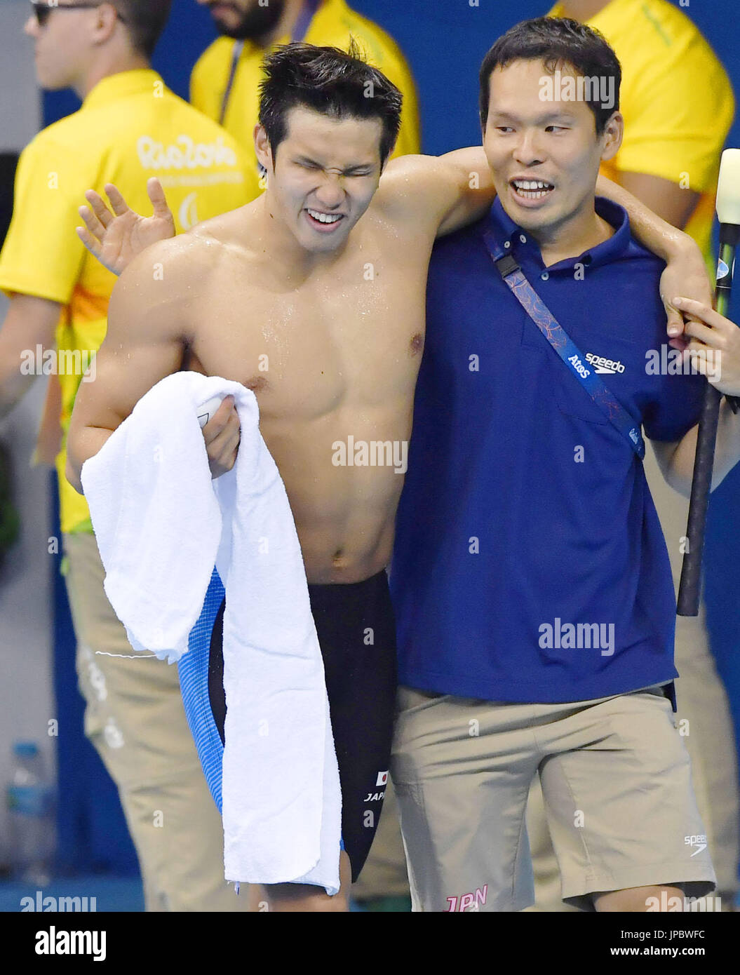 Japan's Keiichi Kimura (L) leaves the pool after winning bronze in the ...