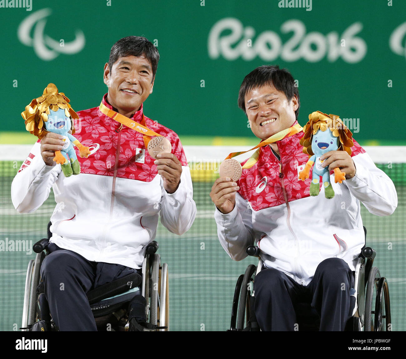 Shingo Kunieda (R) and Satoshi Saida of Japan celebrate winning the ...