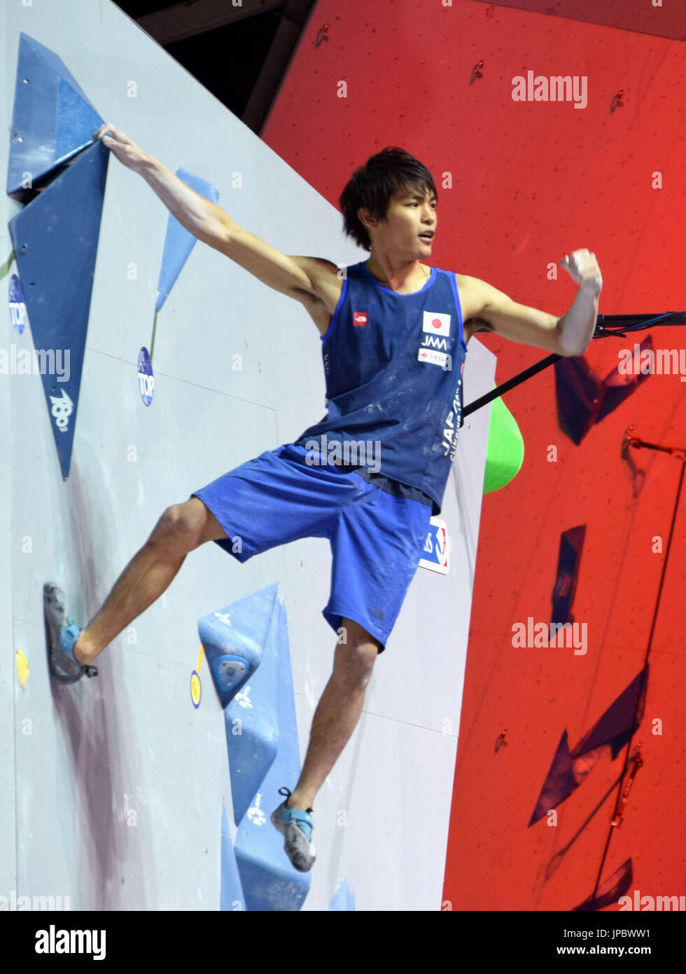 Japan's Tomoa Narasaki celebrates his completion of a bouldering ...