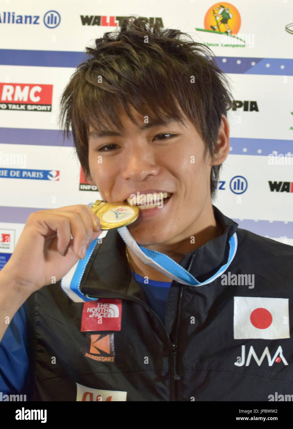 Japan's Tomoa Narasaki poses with his gold medal in the D4 men's ...