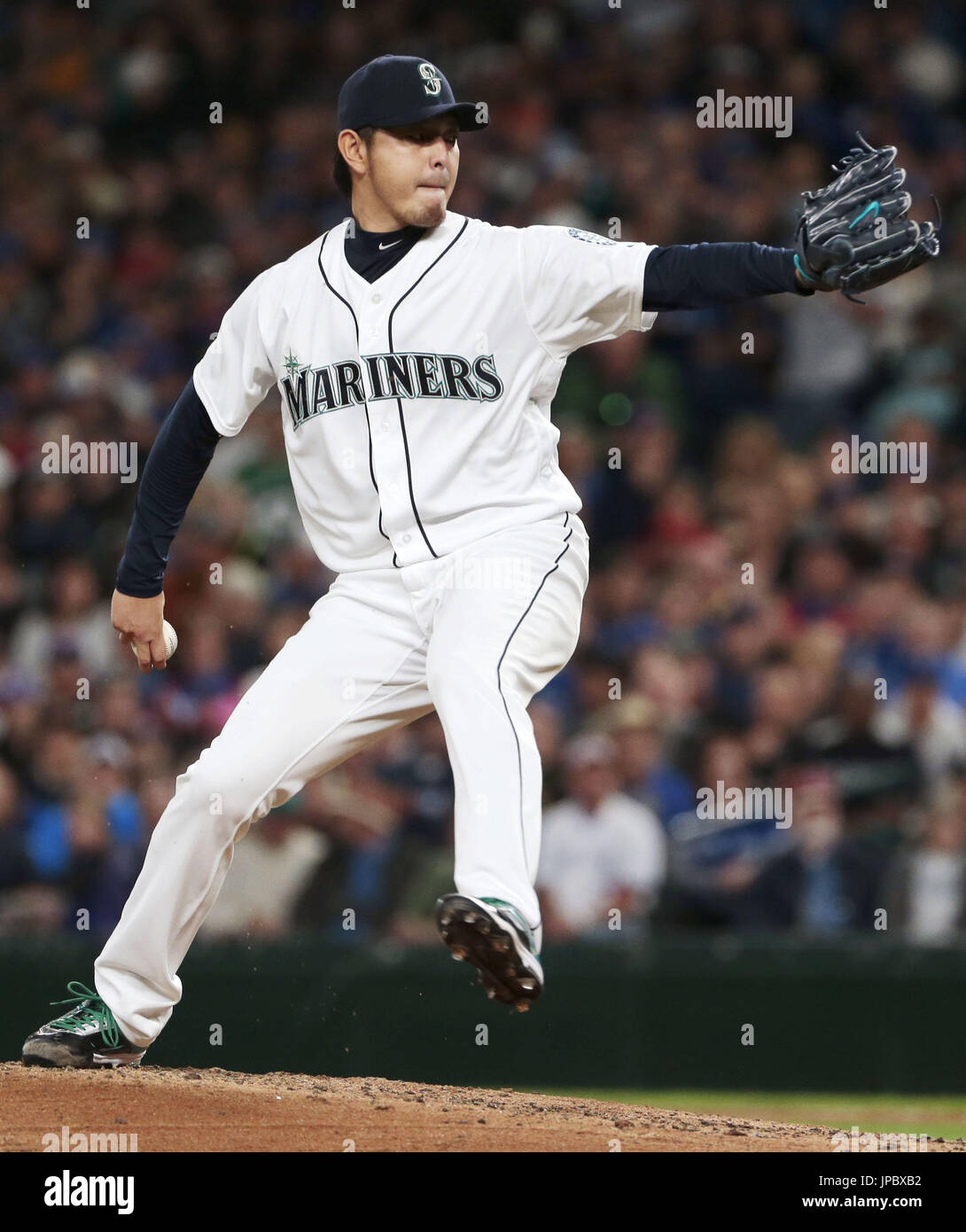 Seattle Mariners right-hander Hisashi Iwakuma pitches during a game ...