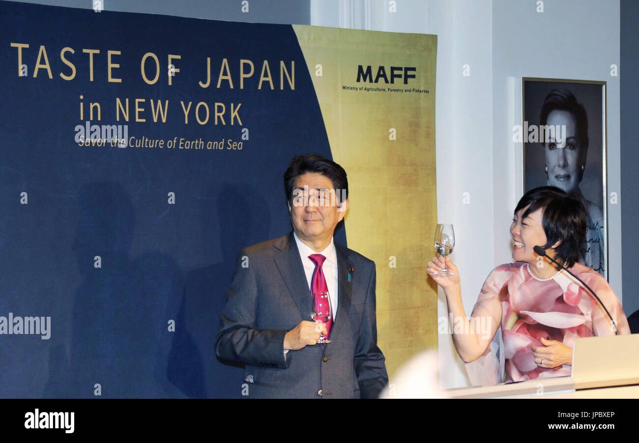 Japanese Prime Minister Shinzo Abe (L) and his wife Akie attend a ...