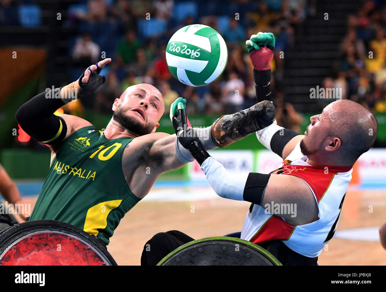 Australia's Chris Bond (L) vies for the ball with Japan's Seiya ...