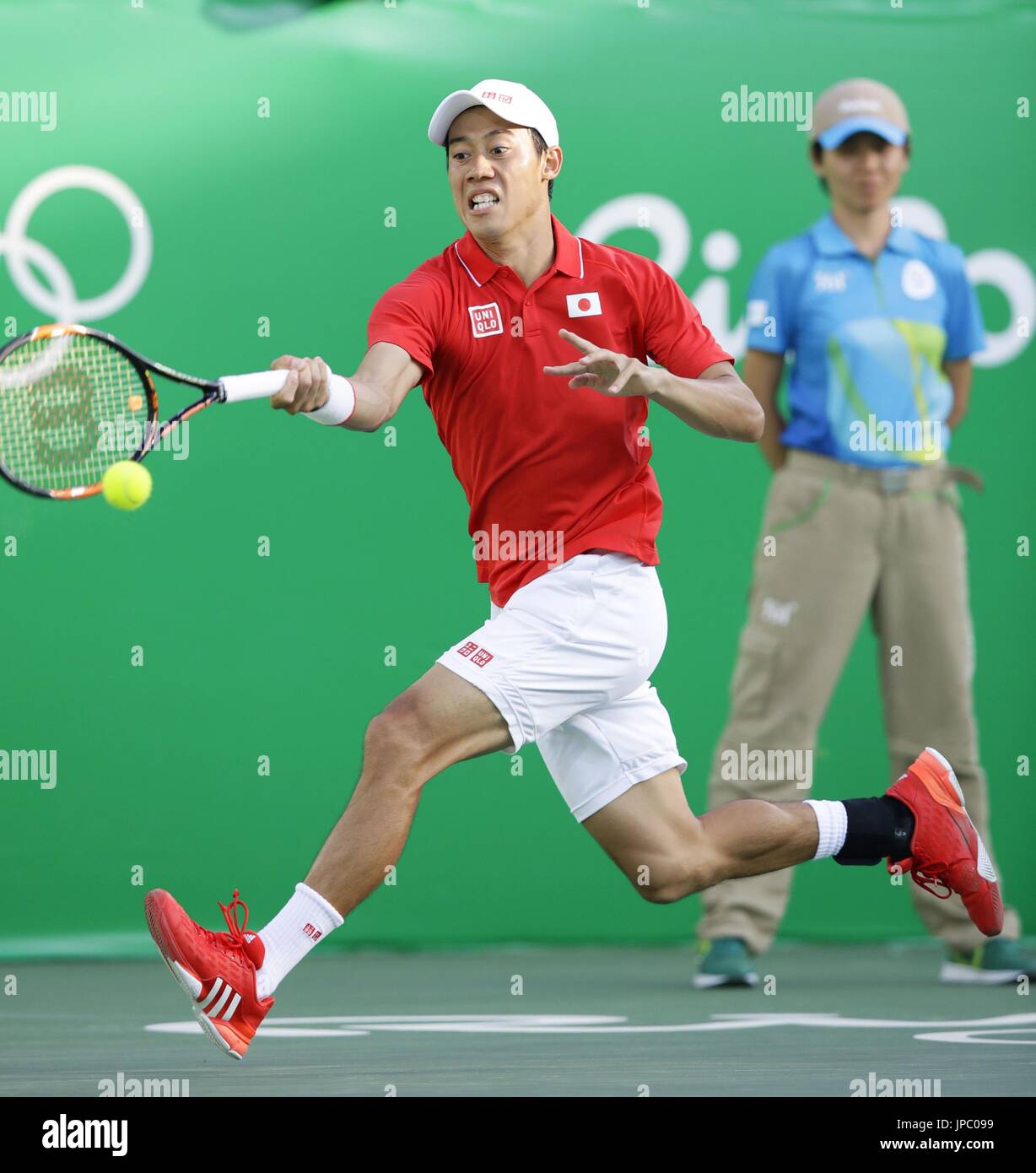 Kei Nishikori of Japan plays a forehand during his bronze-medal match ...