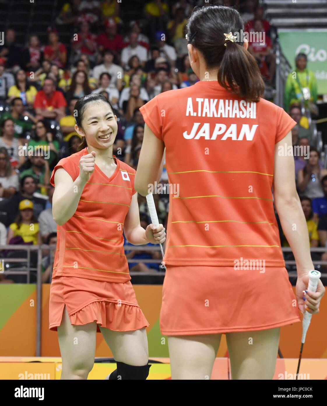 Japanese badminton players Misaki Matsutomo (back) and Ayaka Takahashi ...