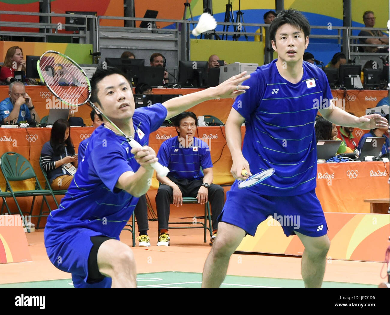 Japanese badminton players Kenichi Hayakawa (R) and Hiroyuki Endo play ...