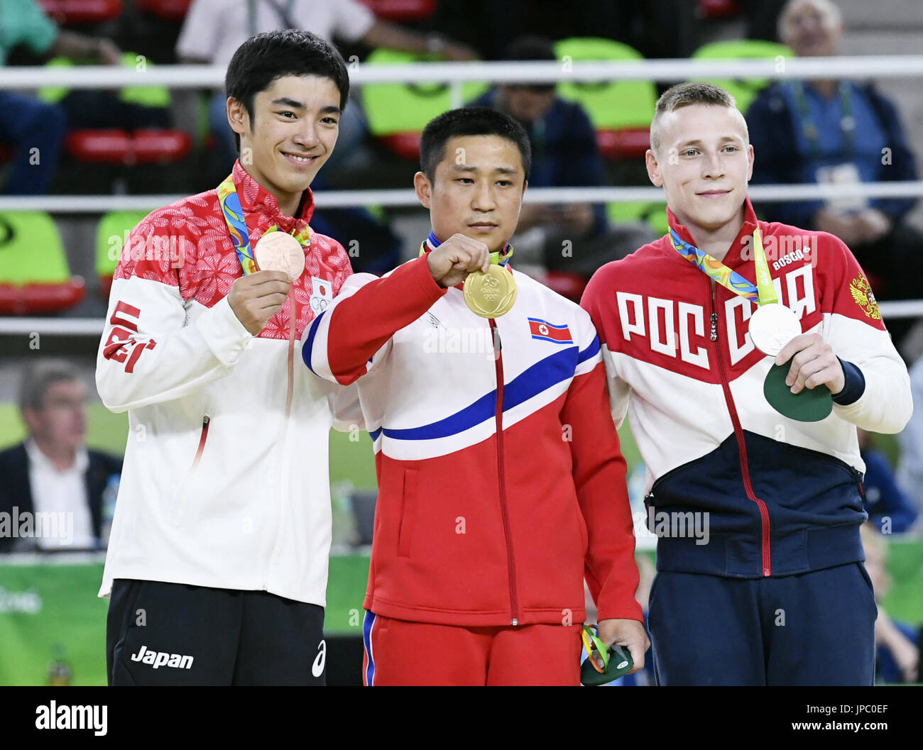 The men's vault gold medalist Ri Se Gwang (C) of North Korea, silver ...
