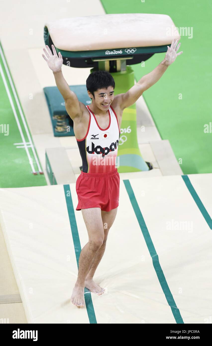 Japanese gymnast Kenzo Shirai smiles and waves to the audience after ...
