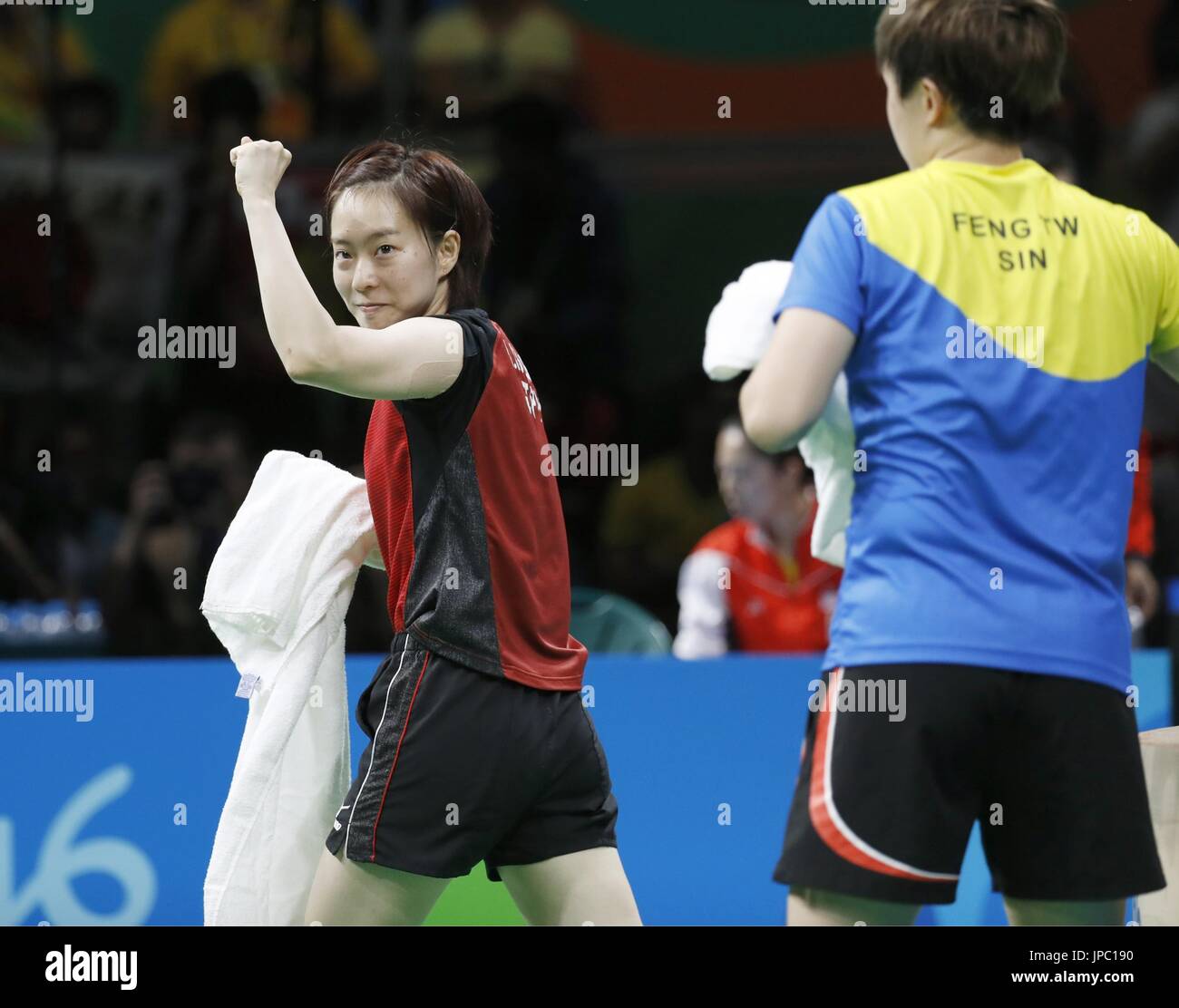Japanese table tennis player Kasumi Ishikawa (L) celebrates her win as ...