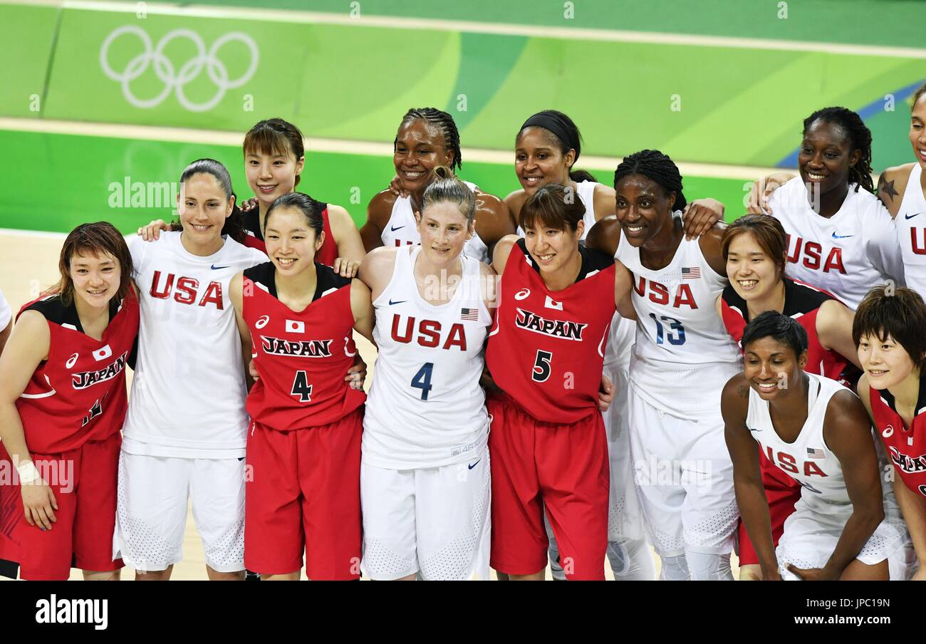 Women's basketball teams of the United States and Japan pose for a ...