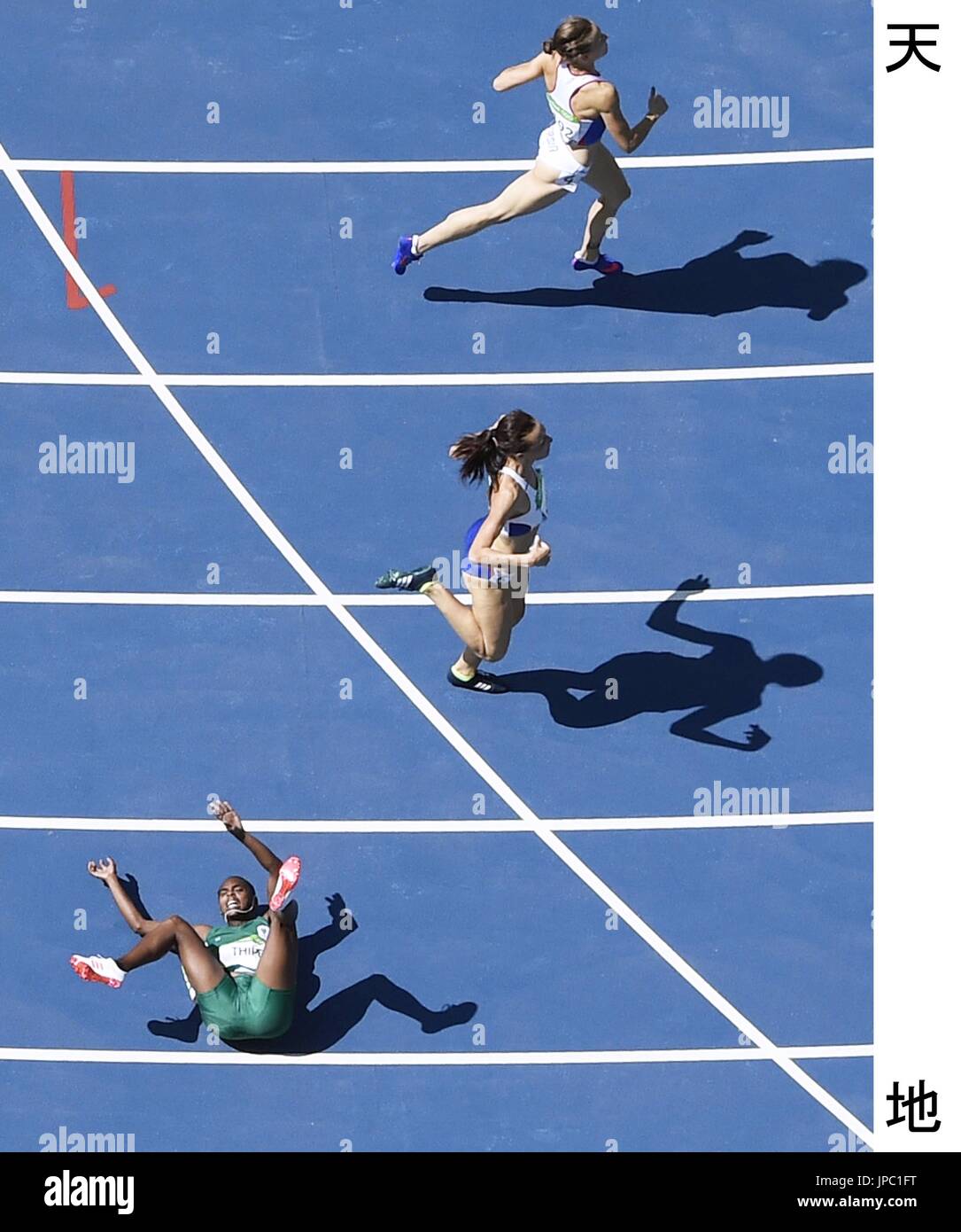 South African sprinter Tsholofelo Thipe tumbles after crossing the ...