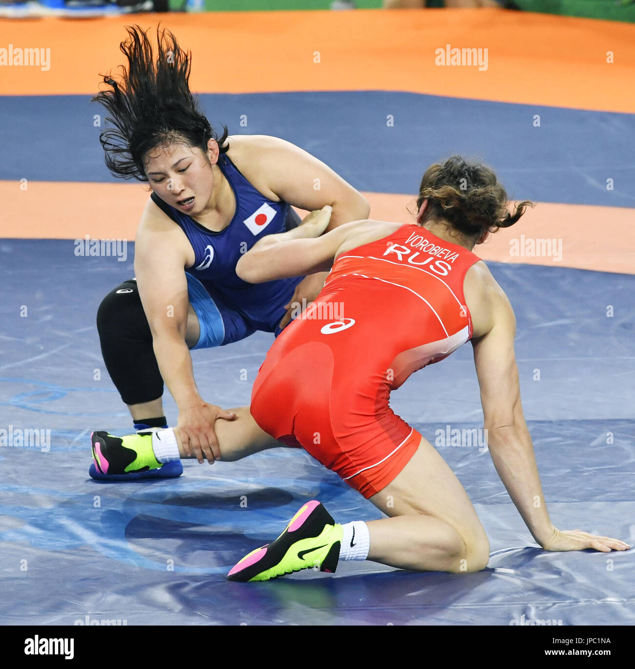 Japan's Sara Dosho (L) competes against Natalia Vorobeva of Russia in ...