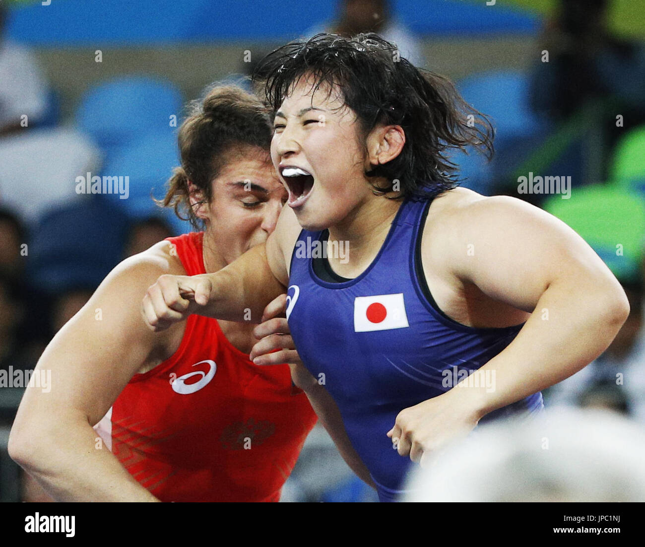 Japan's Sara Dosho (R) celebrates after defeating Natalia Vorobeva of ...