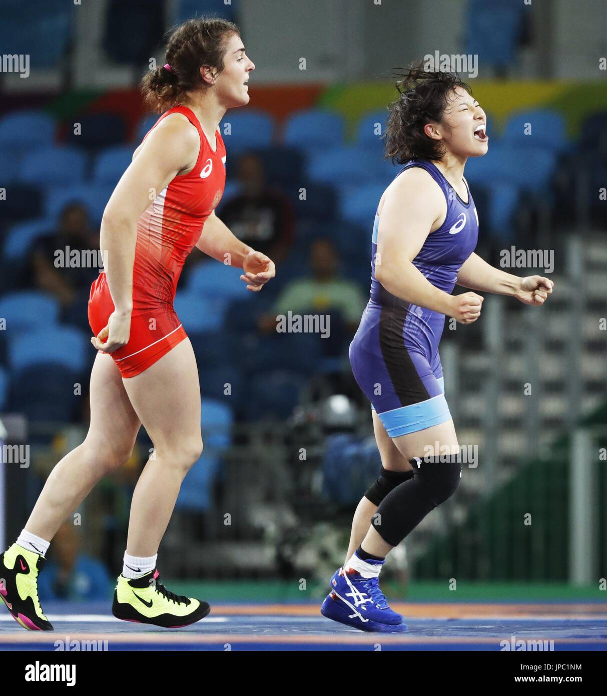 Japan's Sara Dosho (R) celebrates after defeating Natalia Vorobeva of ...