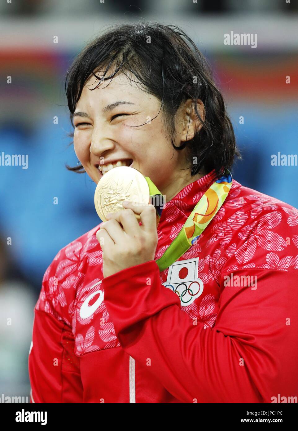 Japan's Sara Dosho smiles with her gold medal during the award ceremony ...
