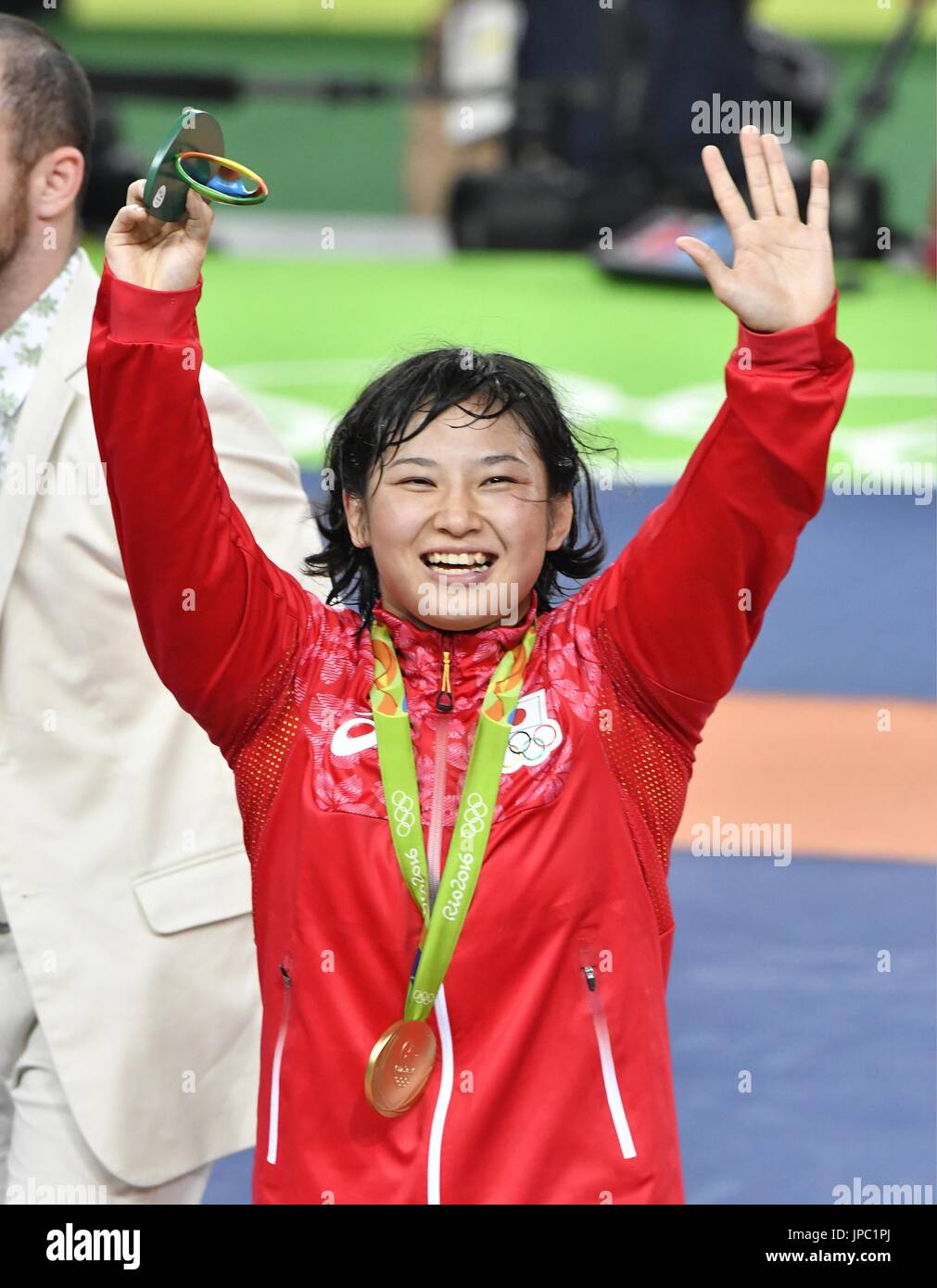 Japanese wrestler Sara Dosho acknowledges the crowd with her gold medal ...