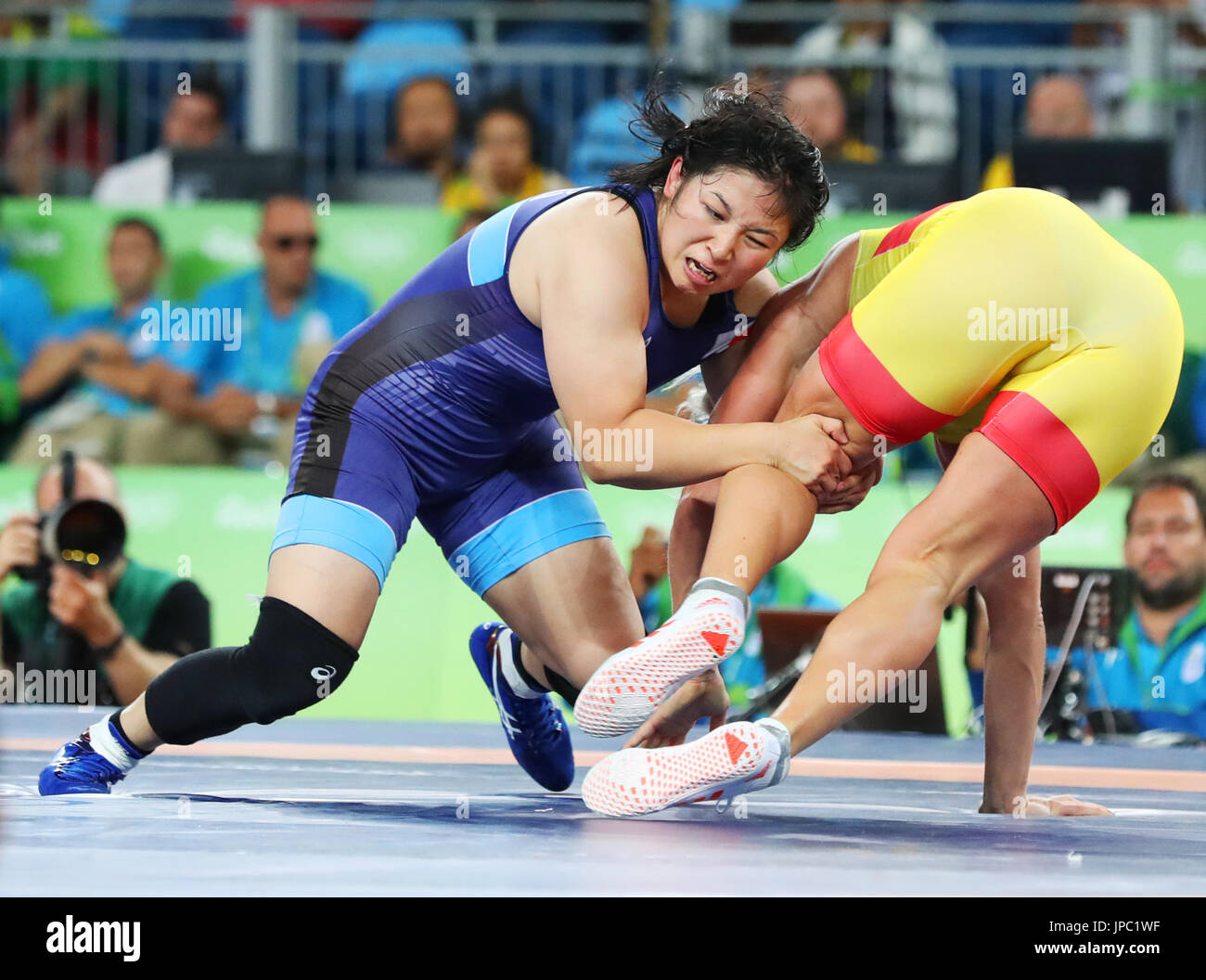 Japanese wrestler Sara Dosho (L) competes against Anna Jenny Fransson ...