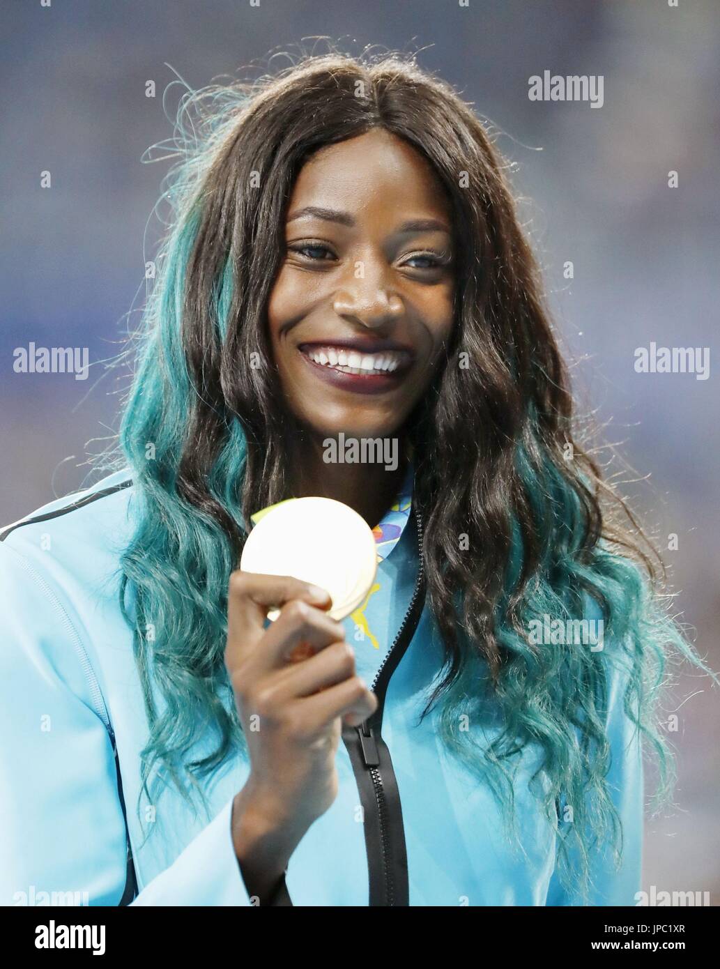 Gold medalist Shaunae Miller of the Bahamas smiles during the medal ...