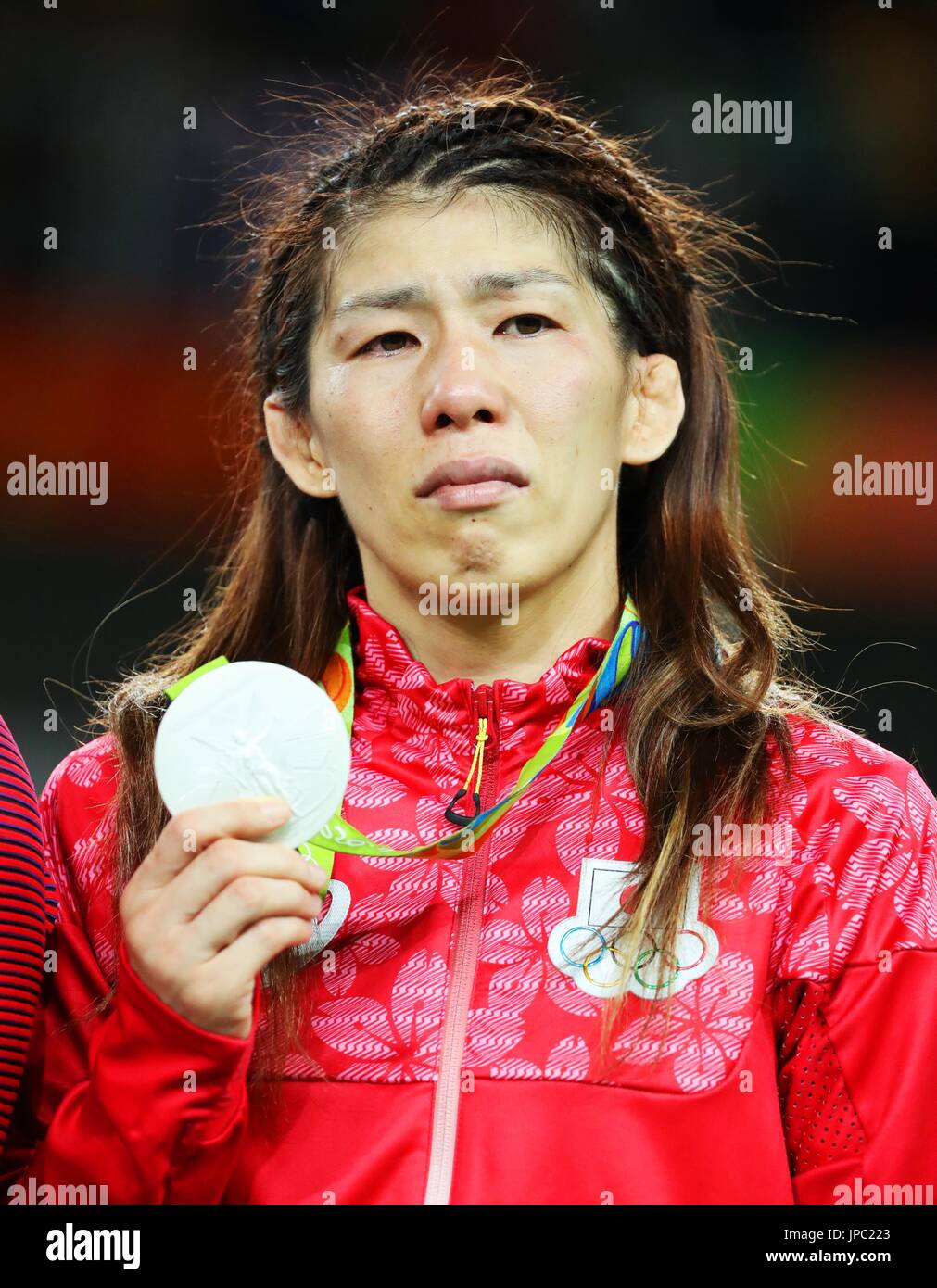 Japanese wrestler Saori Yoshida poses with her silver medal after ...