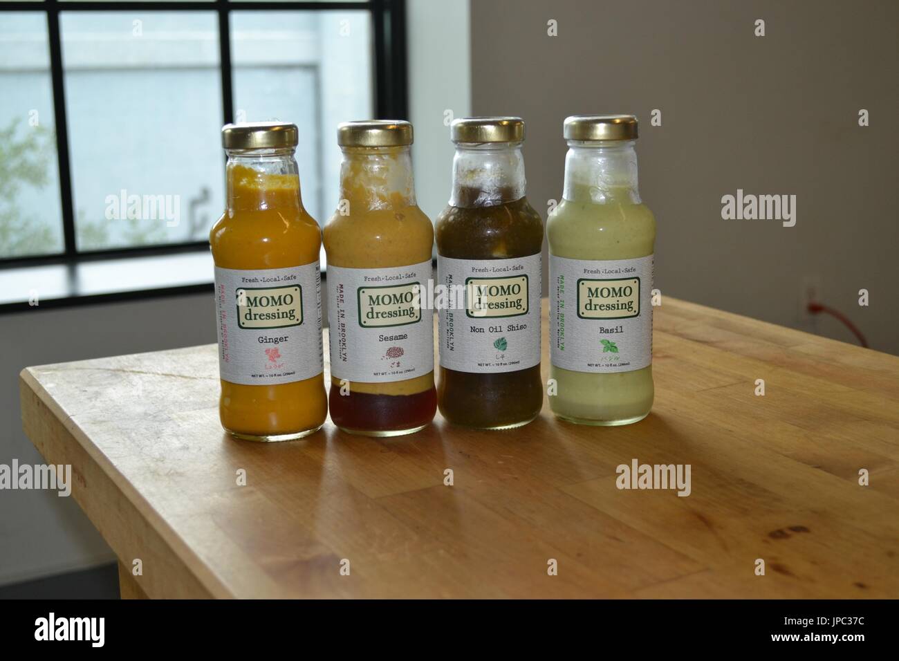 The four main varieties of MOMO Dressing -- ginger, sesame, non-oil ...