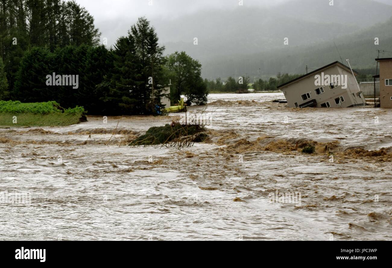 The Sorachi River is flooded in the town of Minamifurano in Japan's ...
