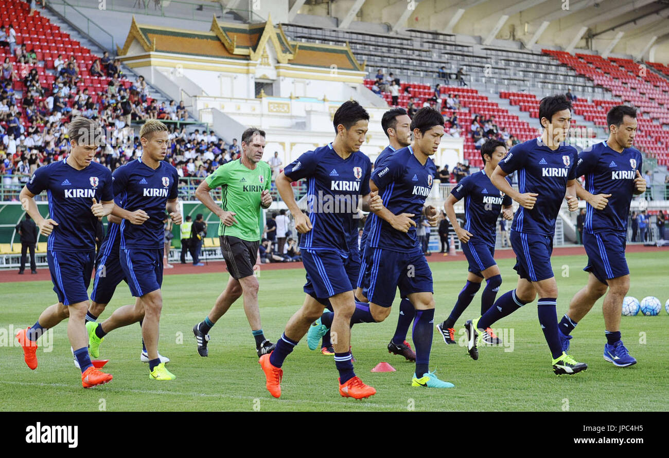 Japan's soccer players participate in a training session in Bangkok on ...