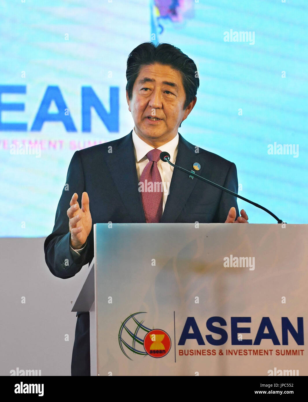 Japan's Prime Minister Shinzo Abe gives a speech at the ASEAN Business ...
