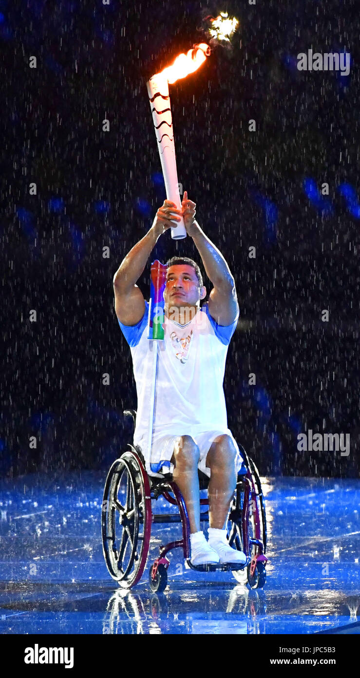 Brazilian swimmer Clodoaldo Silva, as the last runner of the Rio de ...
