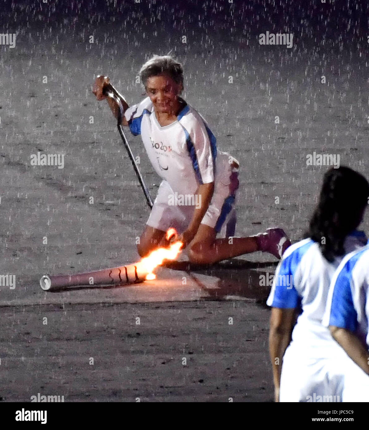Former Brazilian Paralympian Marcia Malsar, the third from last runner ...