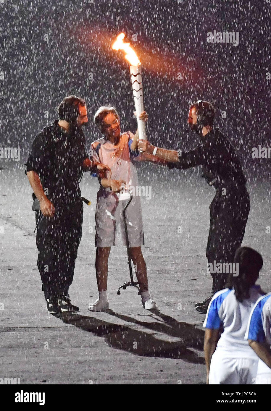 Former Brazilian Paralympian Marcia Malsar (C), the third from last ...