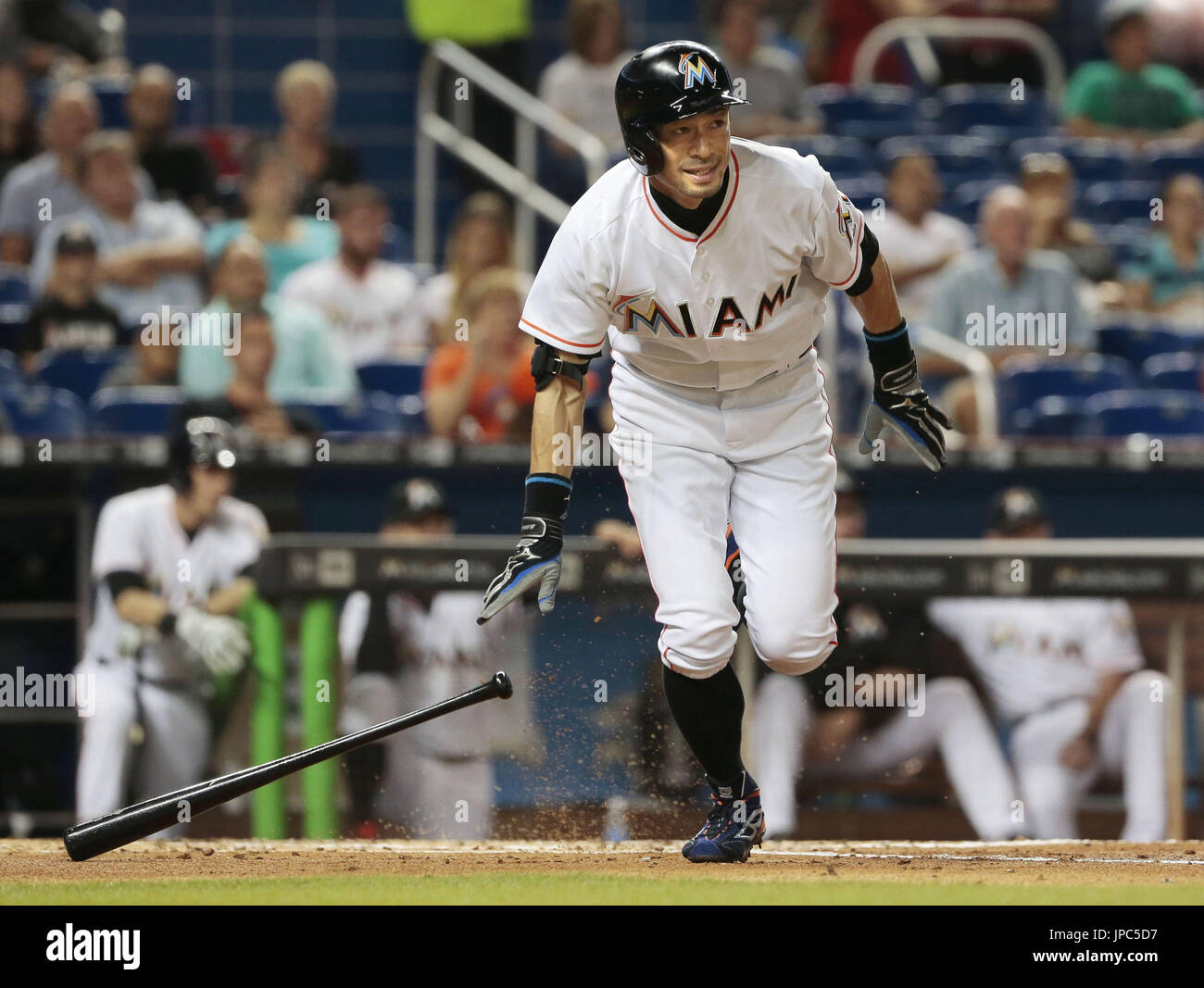 Ichiro Suzuki hits a triple in the first inning of the Miami Marlins' 6 ...