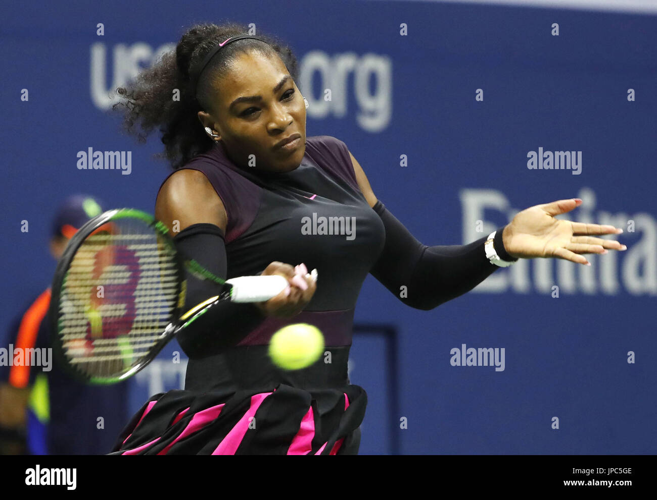 Selena Williams of the United States returns a shot during a semifinal ...