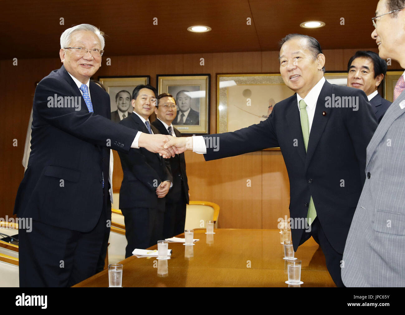 Tang Jiaxuan (L), former Chinese state councilor and foreign minister ...