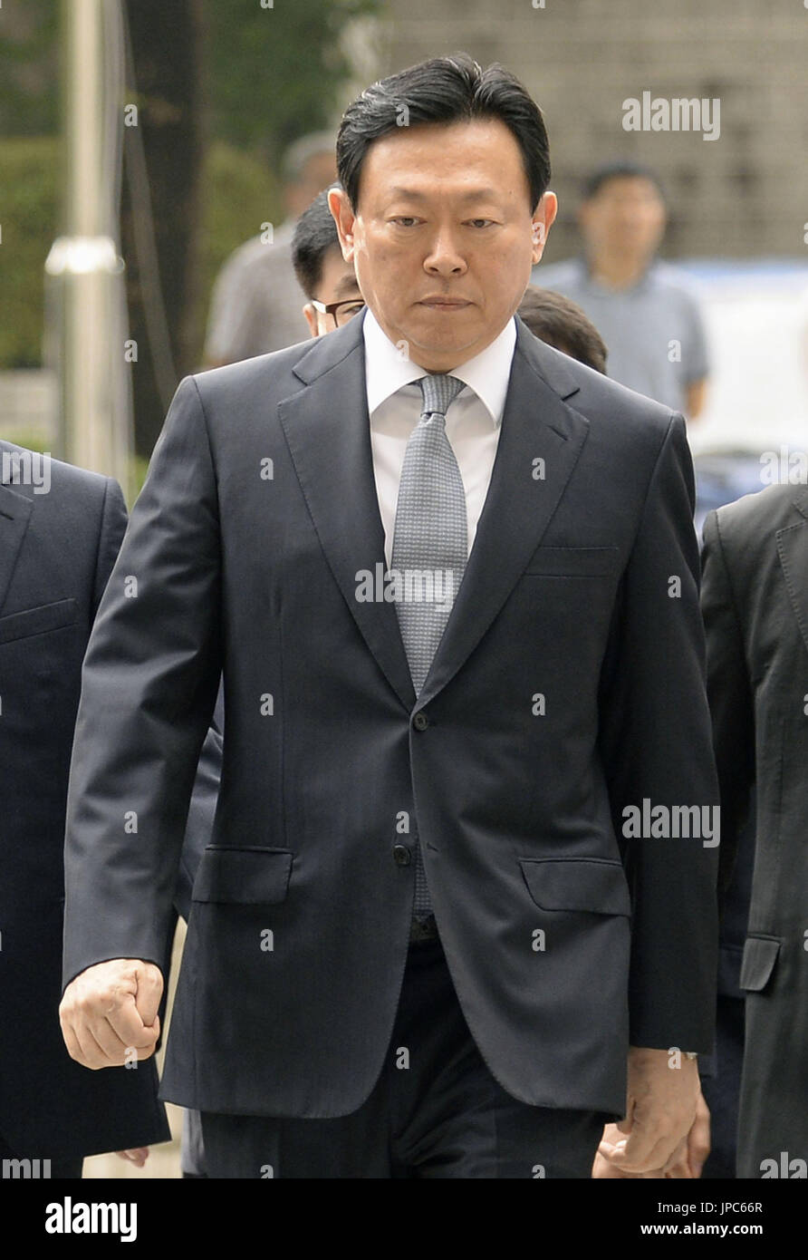 Lotte Group Chairman Shin Dong Bin arrives at a Seoul court on Sept. 28 ...