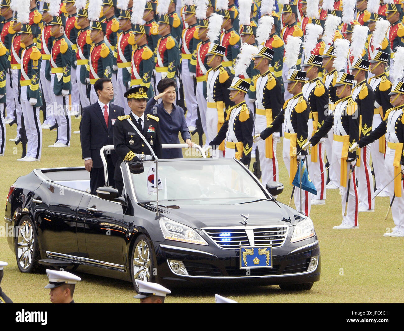 South Korean President Park Geun Hye (R in vehicle) attends a ceremony ...