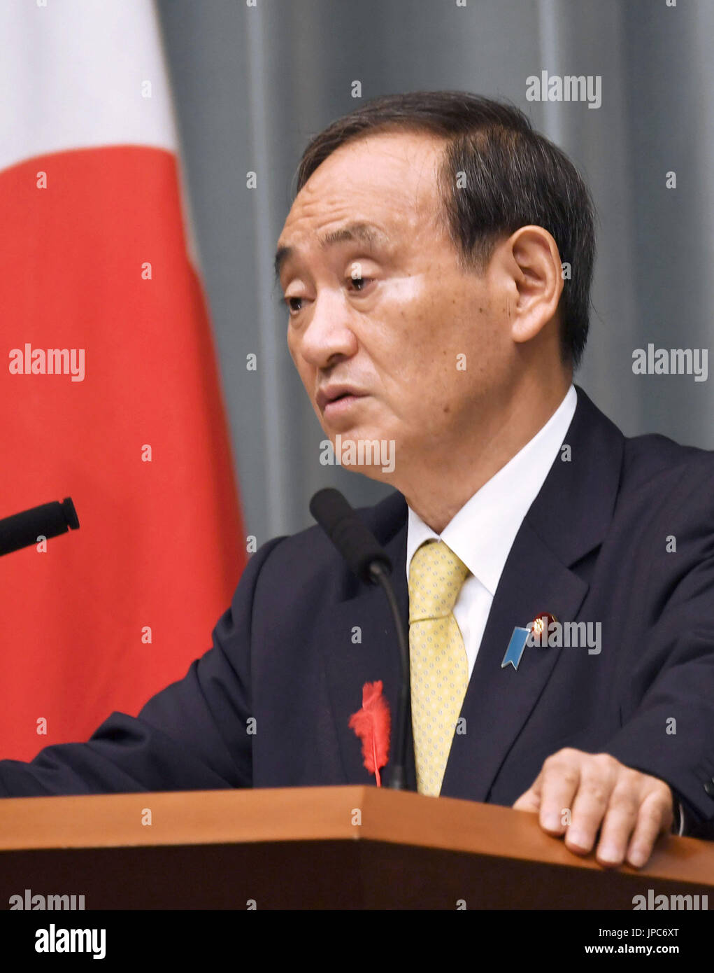 Chief Cabinet Secretary Yoshihide Suga, at a press conference in Tokyo ...