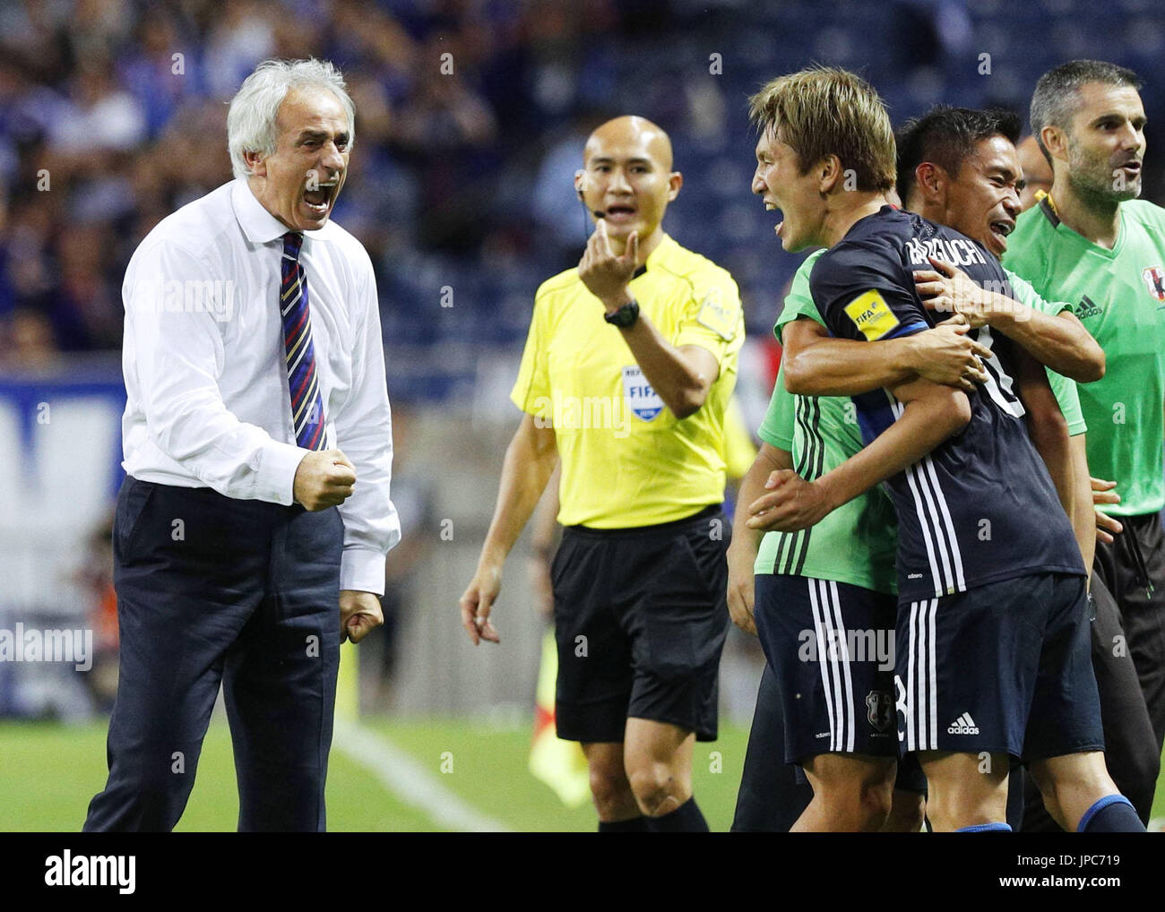 Japan coach Vahid Halilhodzic (L) celebrates after Hotaru Yamaguchi ...