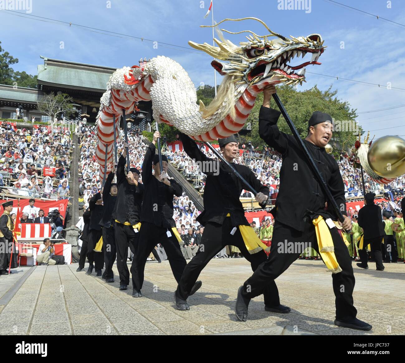 Dragon dancers perform during a traditional Nagasaki Kunchi autumn ...