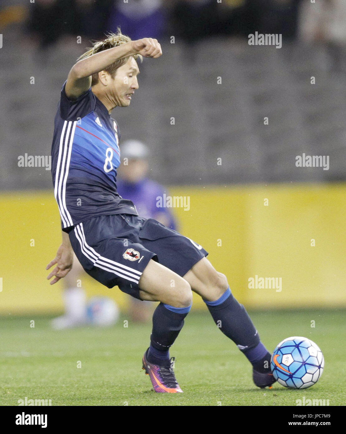 Japan's Genki Haraguchi scores the opener during the first half of a ...