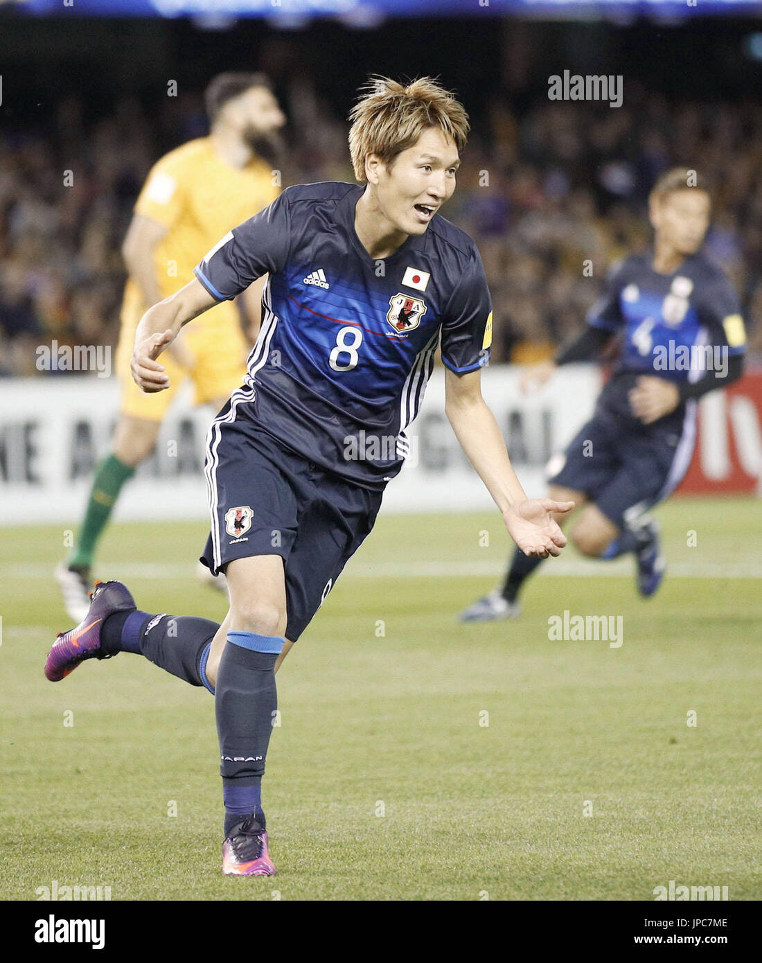Genki Haraguchi of Japan (8) celebrates after scoring the opening goal ...