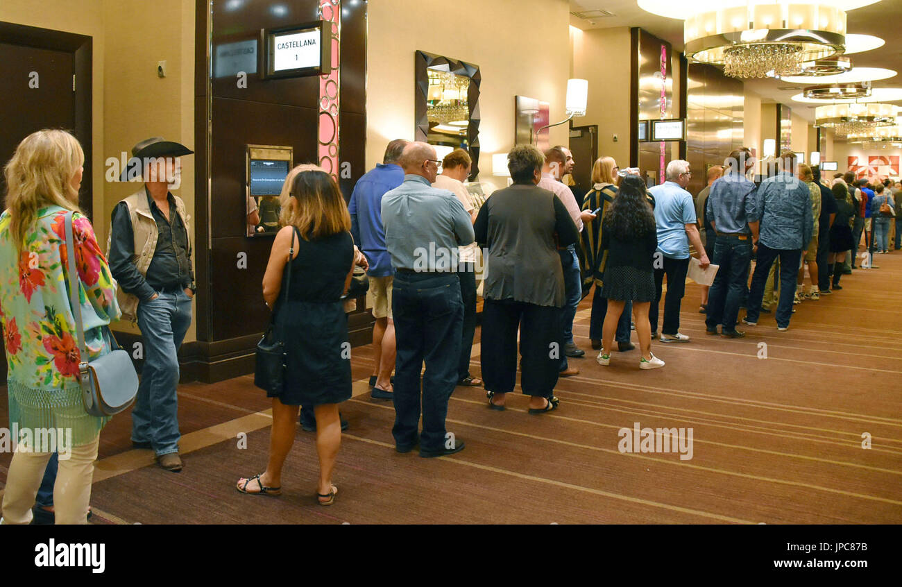 Fans line up at the venue of Bob Dylan's concert in Las Vegas on Oct ...