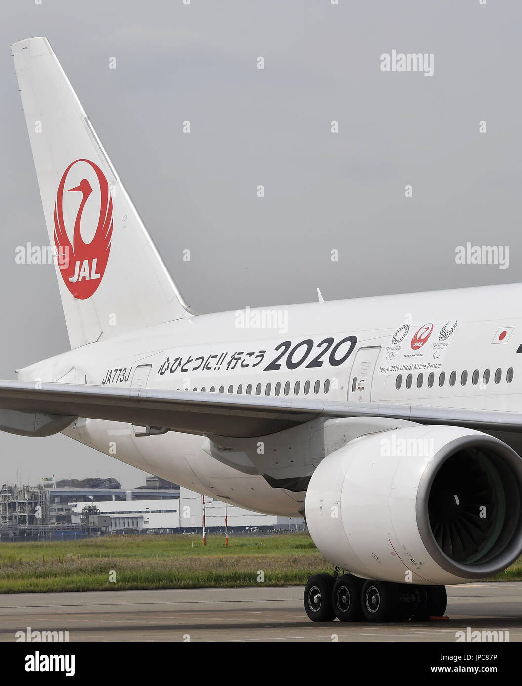 A Japan Airlines Co. plane with the logos of the 2020 Tokyo Olympics ...