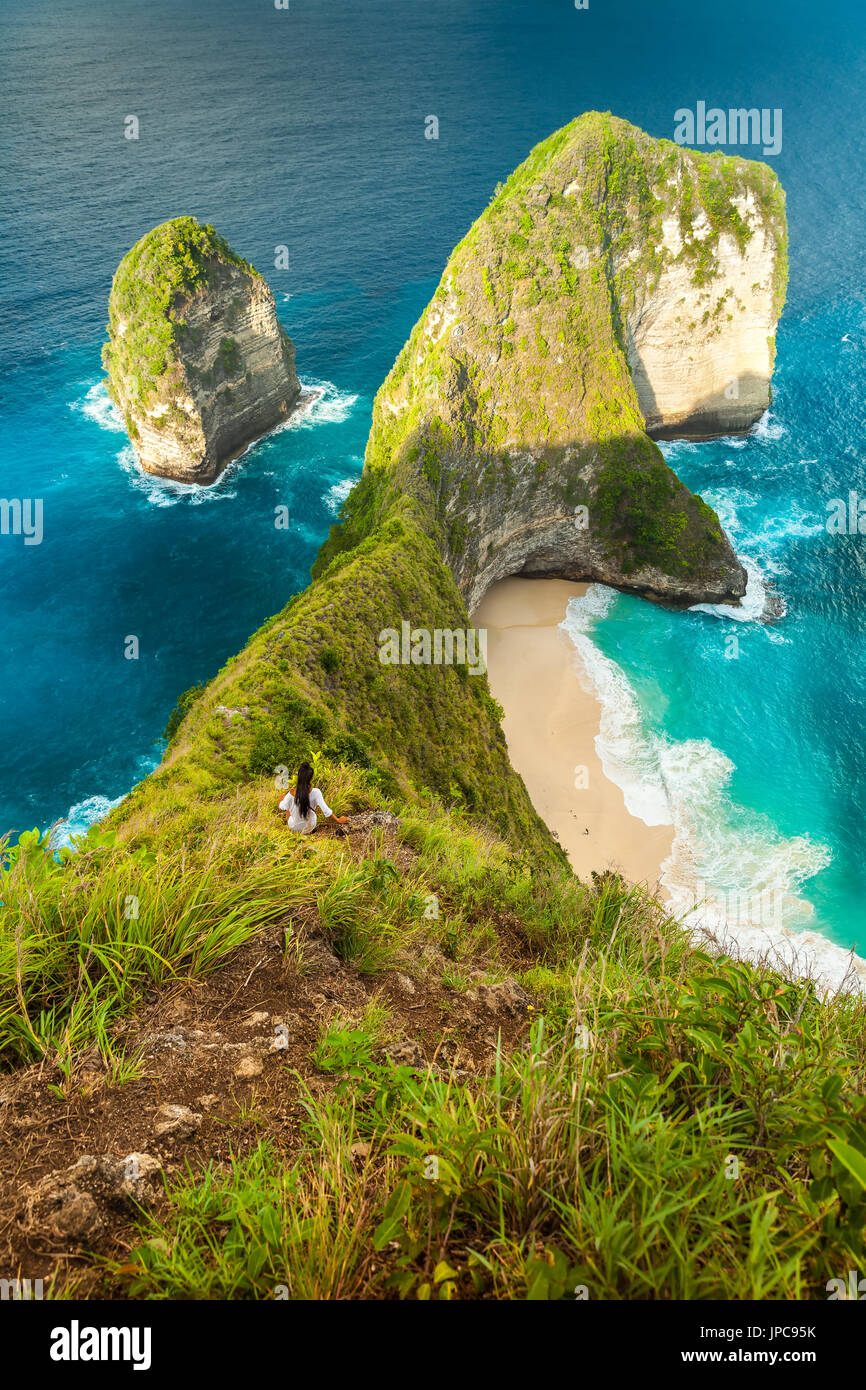 Azure beach with rocky mountains and clear sea water on background ...