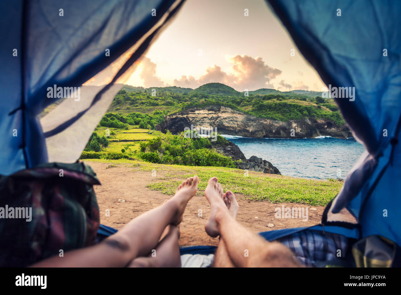 Azure beach with rocky mountains and clear sea water on background ...