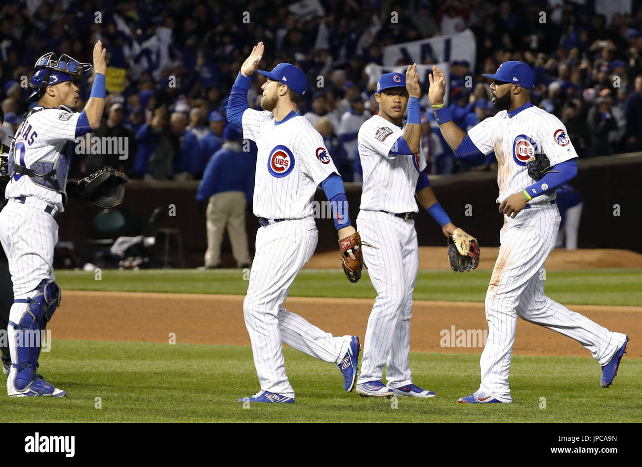 The Chicago Cubs celebrate their World Series Game 5 victory at Wrigley ...