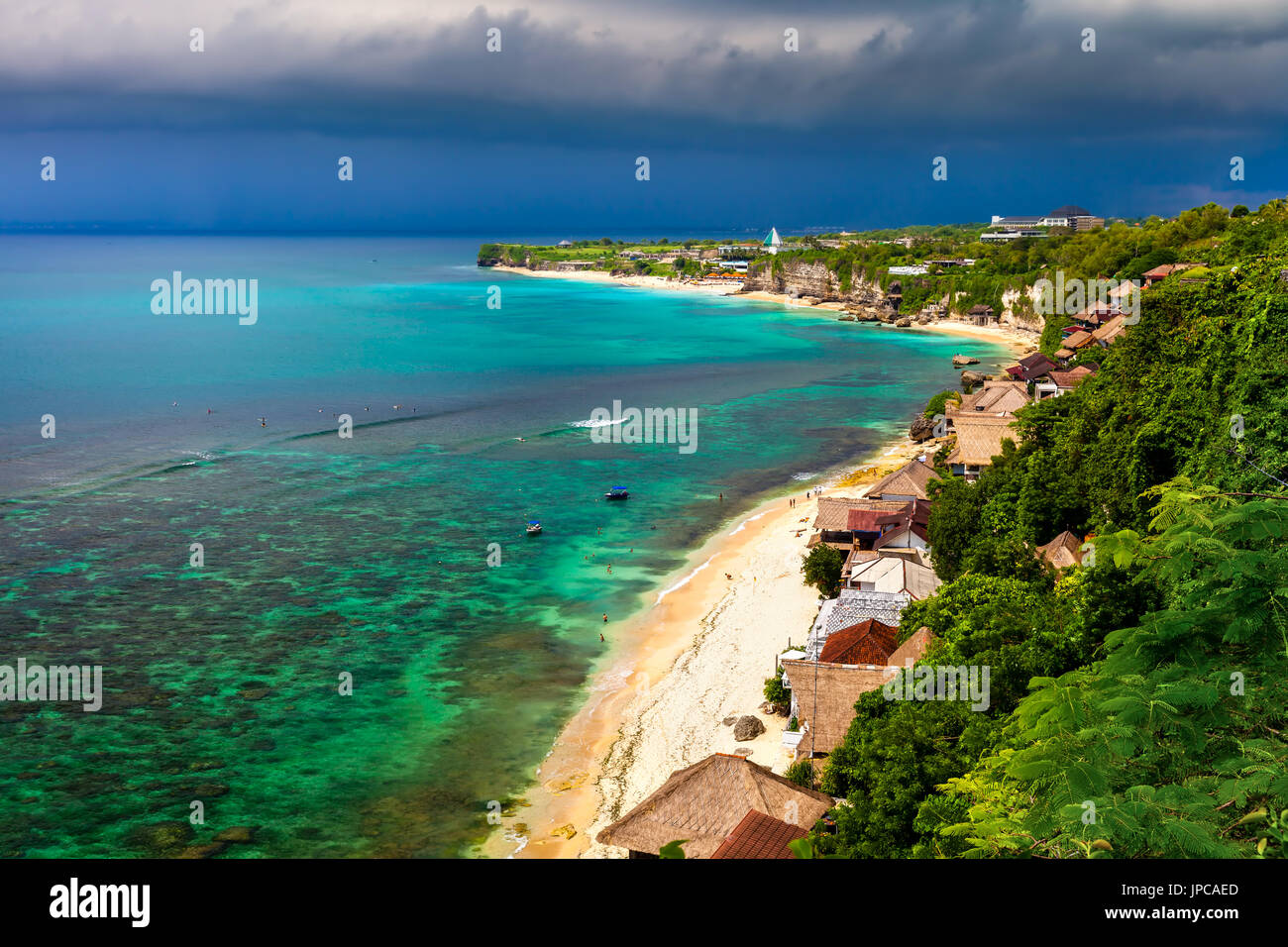Azure beach with rocky mountains and clear sea water on background ...
