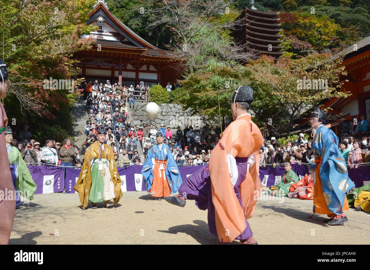 Members of the Kemari Preservation Society dressed in ancient court ...