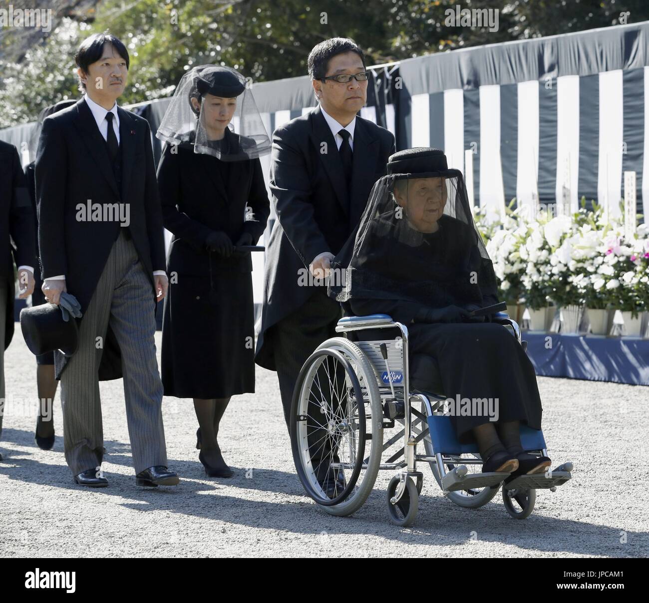 Princess Yuriko (in a wheelchair), wife of the late Prince Mikasa, as ...